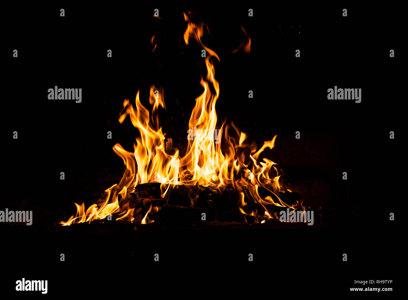 Fire flames burning isolated on black background. High resolution wood ...