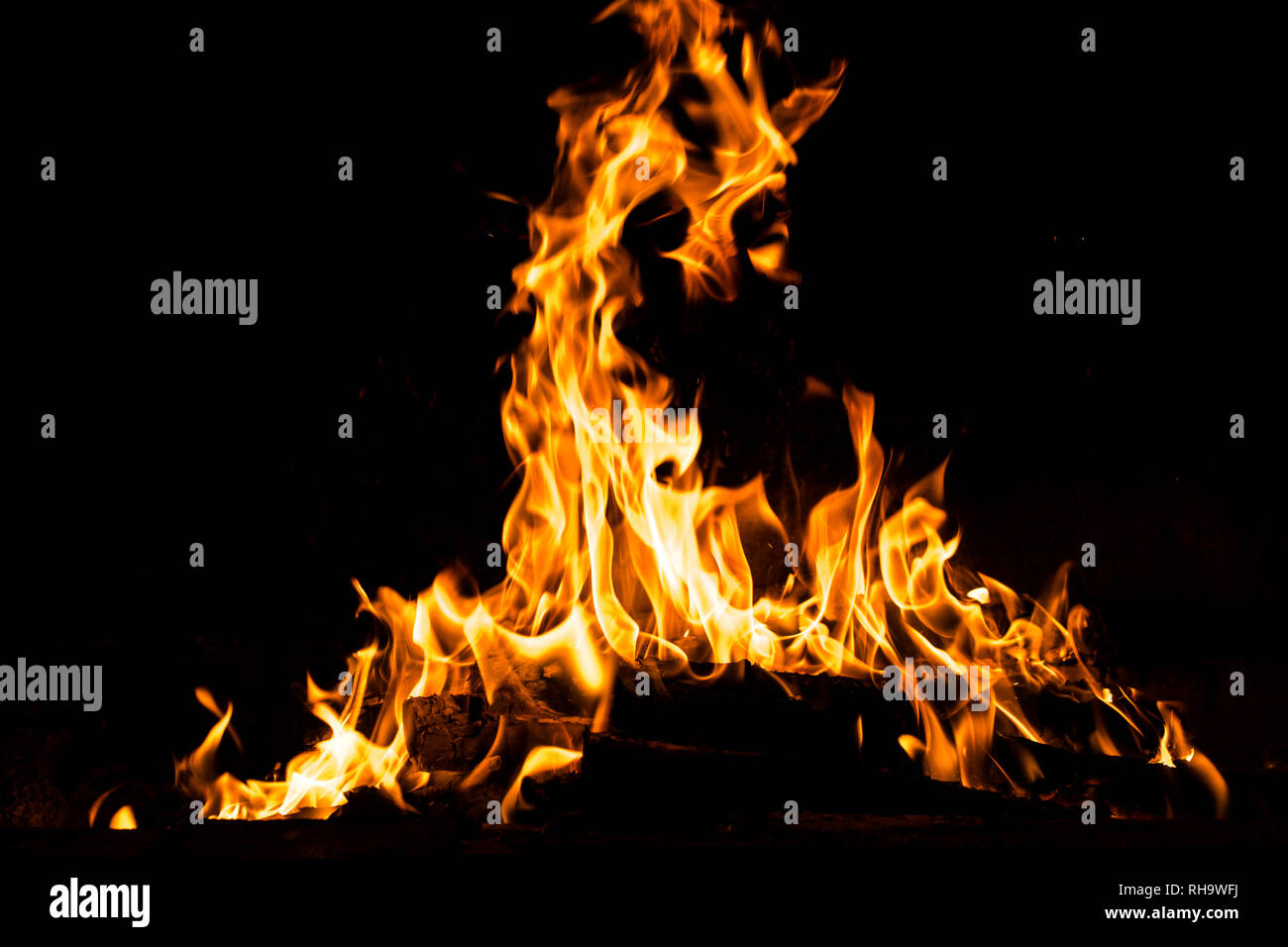 Fire flames burning isolated on black background. High resolution wood ...
