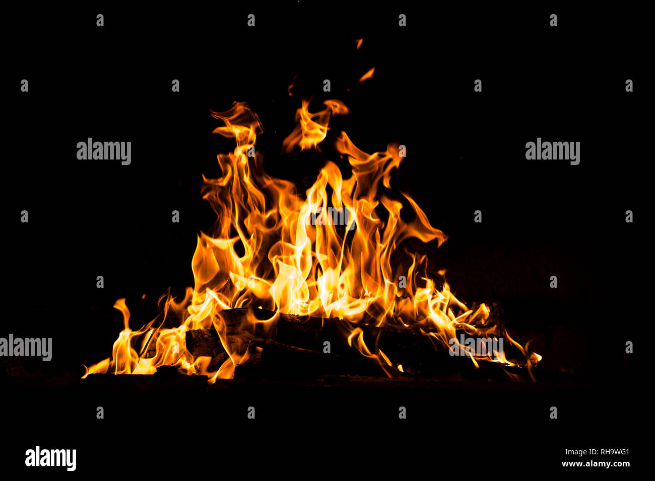 Fire flames burning isolated on black background. High resolution wood ...