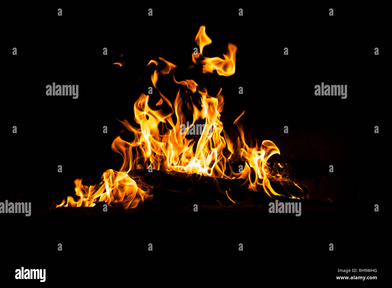 Fire flames burning isolated on black background. High resolution wood ...