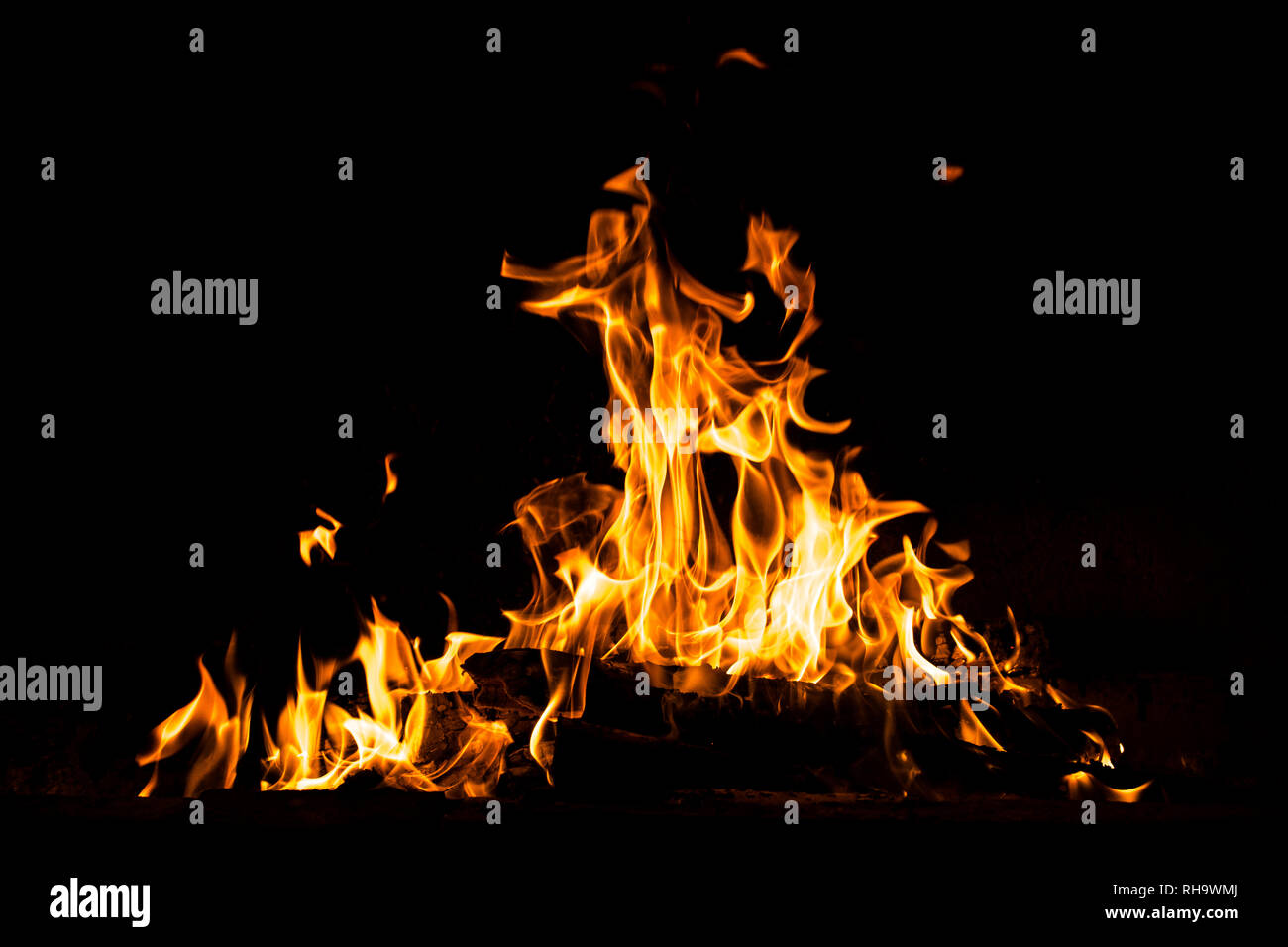 Fire flames burning isolated on black background. High resolution wood ...