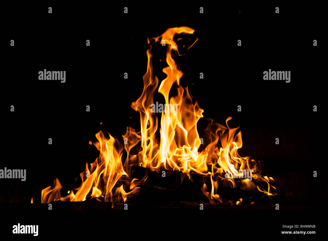 Fire flames burning isolated on black background. High resolution wood ...