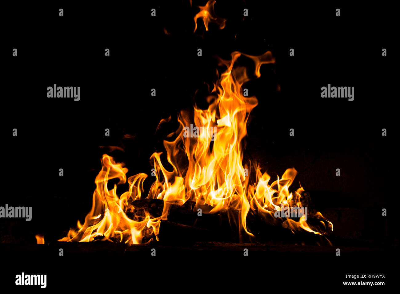 Fire flames burning isolated on black background. High resolution wood ...