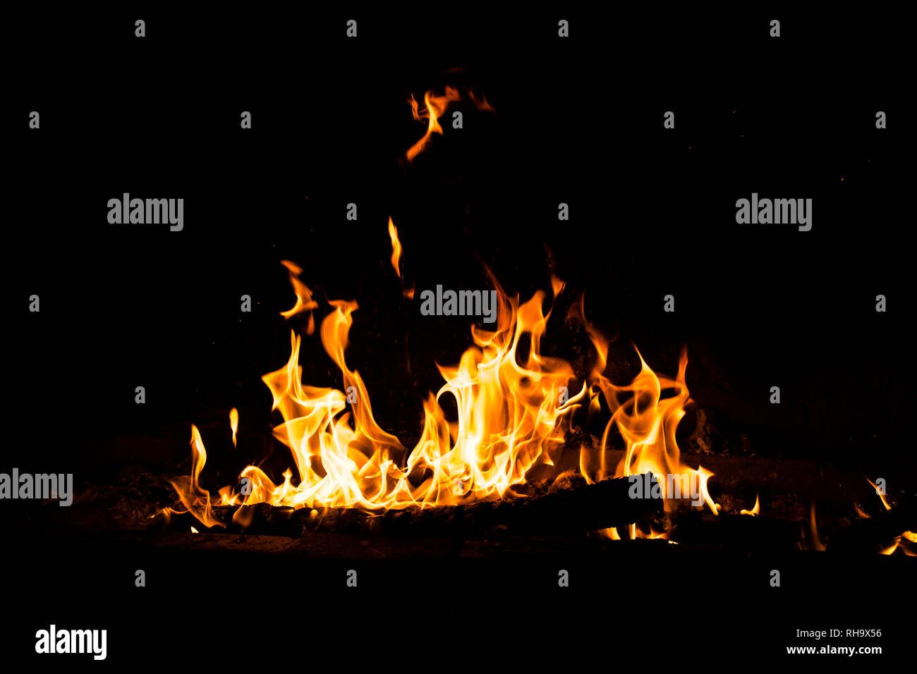 Fire flames burning isolated on black background. High resolution wood ...