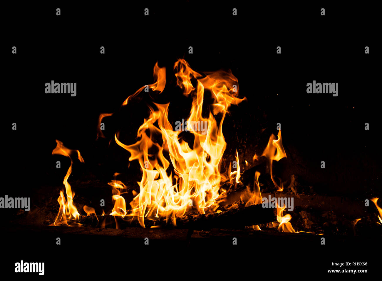 Fire flames burning isolated on black background. High resolution wood ...