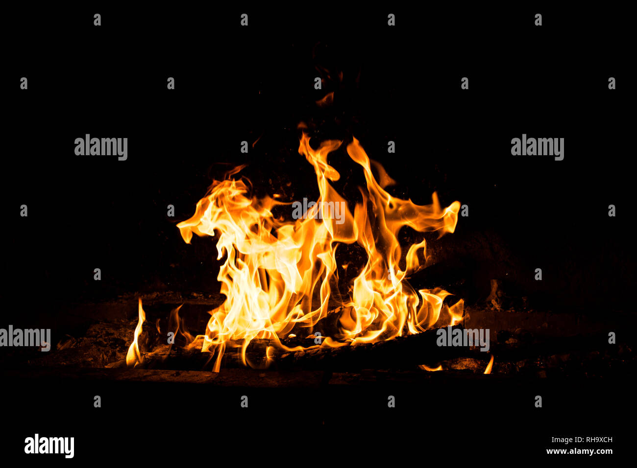 Fire flames burning isolated on black background. High resolution wood ...