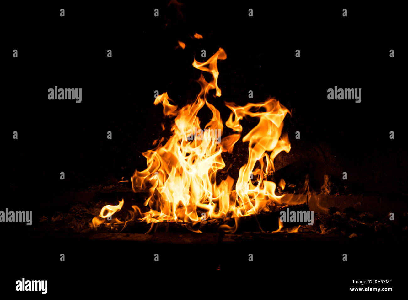 Fire flames burning isolated on black background. High resolution wood ...
