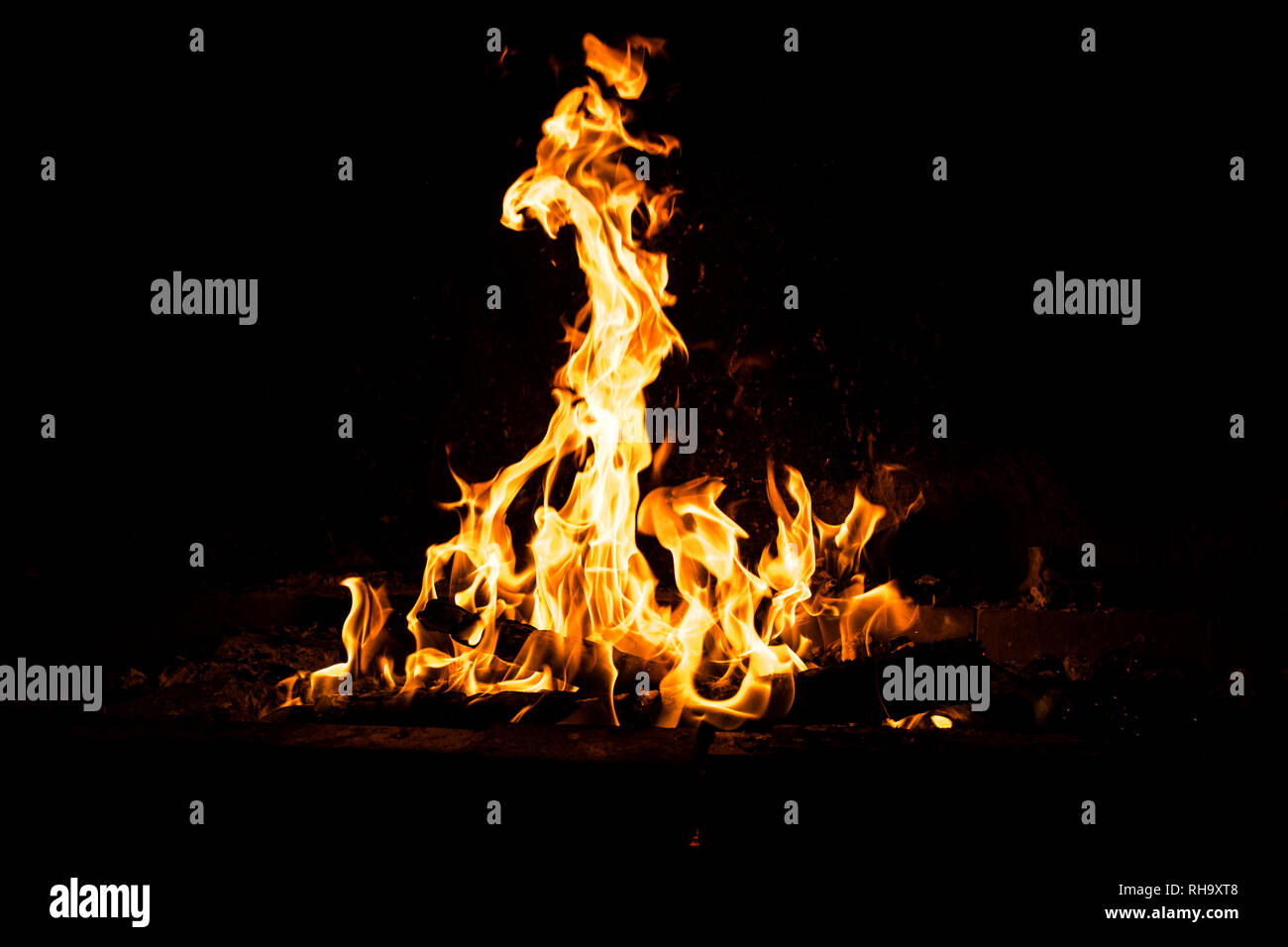 Fire flames burning isolated on black background. High resolution wood ...