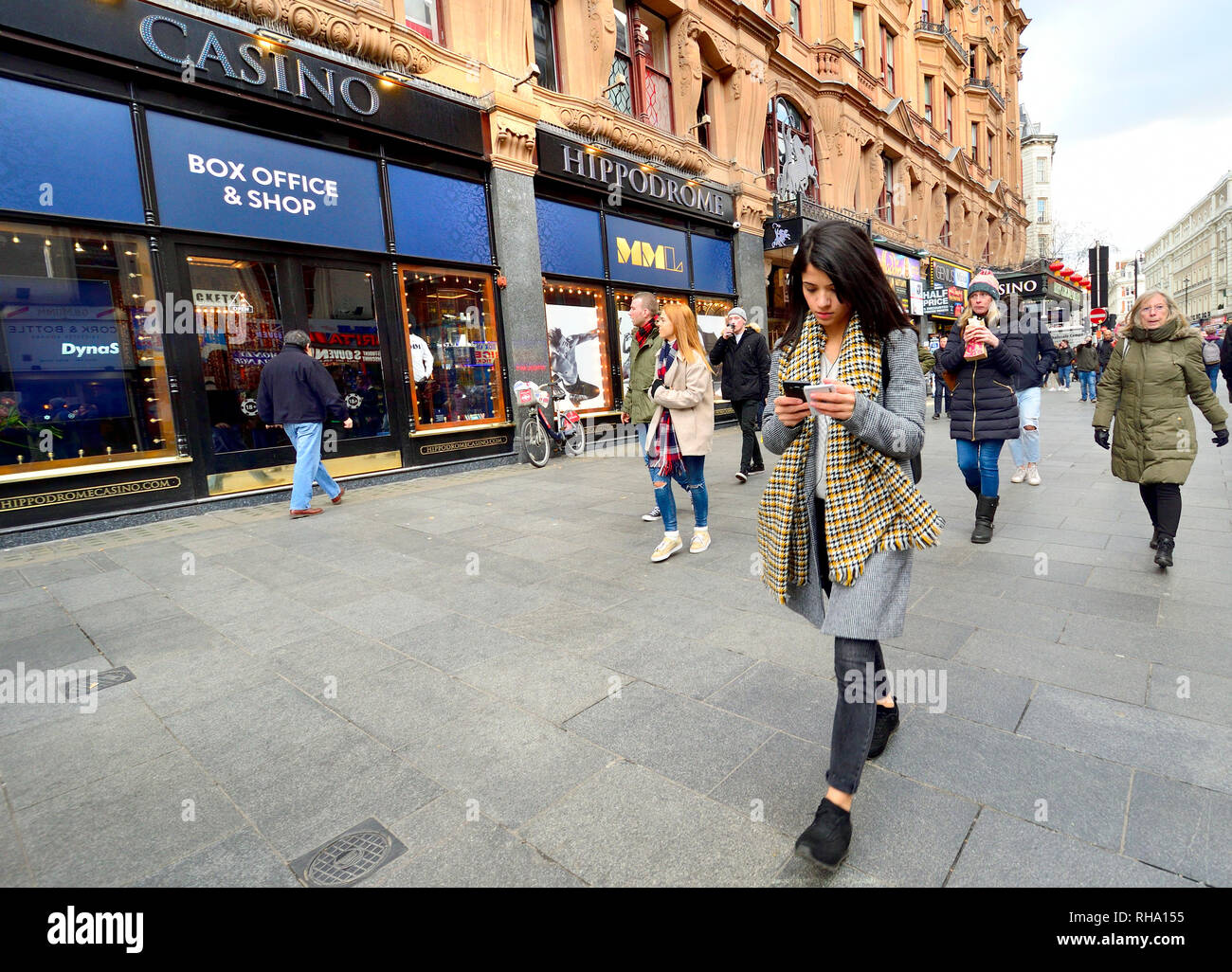 London, England, UK. Young woman with two mobile phones, Leicester ...