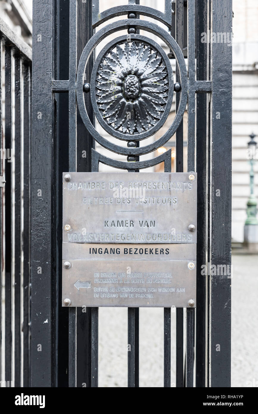 Metal sign, indicating the visitor entrance at the facade of the ...