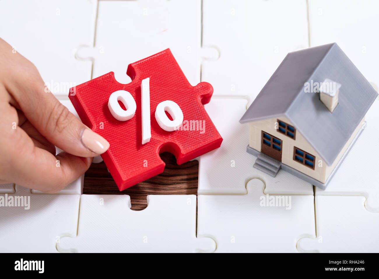 An Overhead View Of A Person Holding Percentage Puzzle Pieces Near The ...