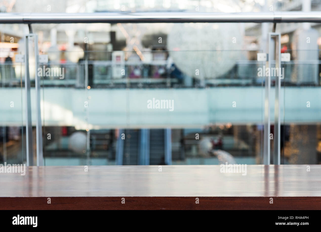 Bench in the blurred shopping mall, for your goods Stock Photo - Alamy