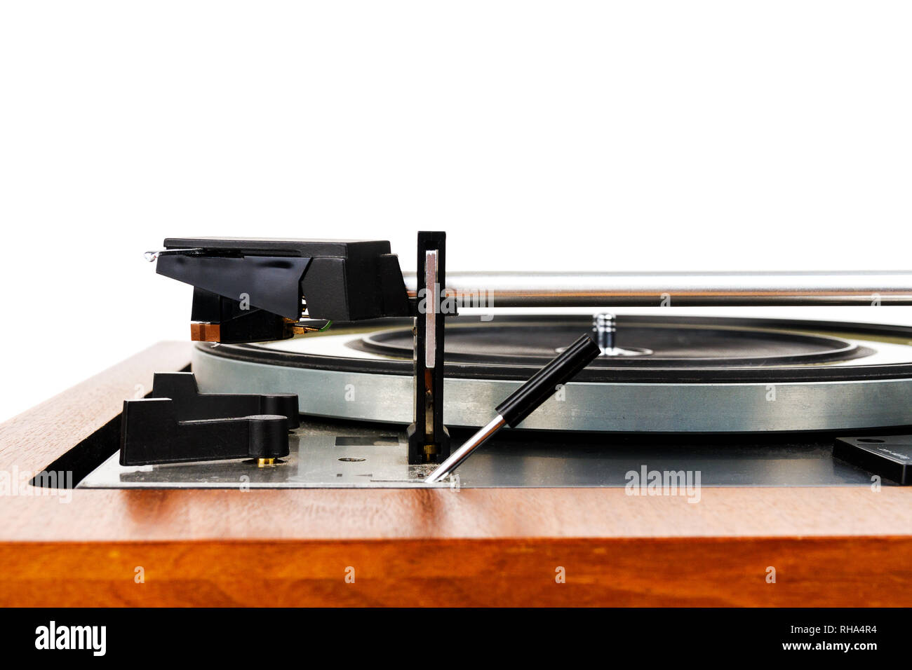 Side view of vintage turntable vinyl record player isolated on white ...