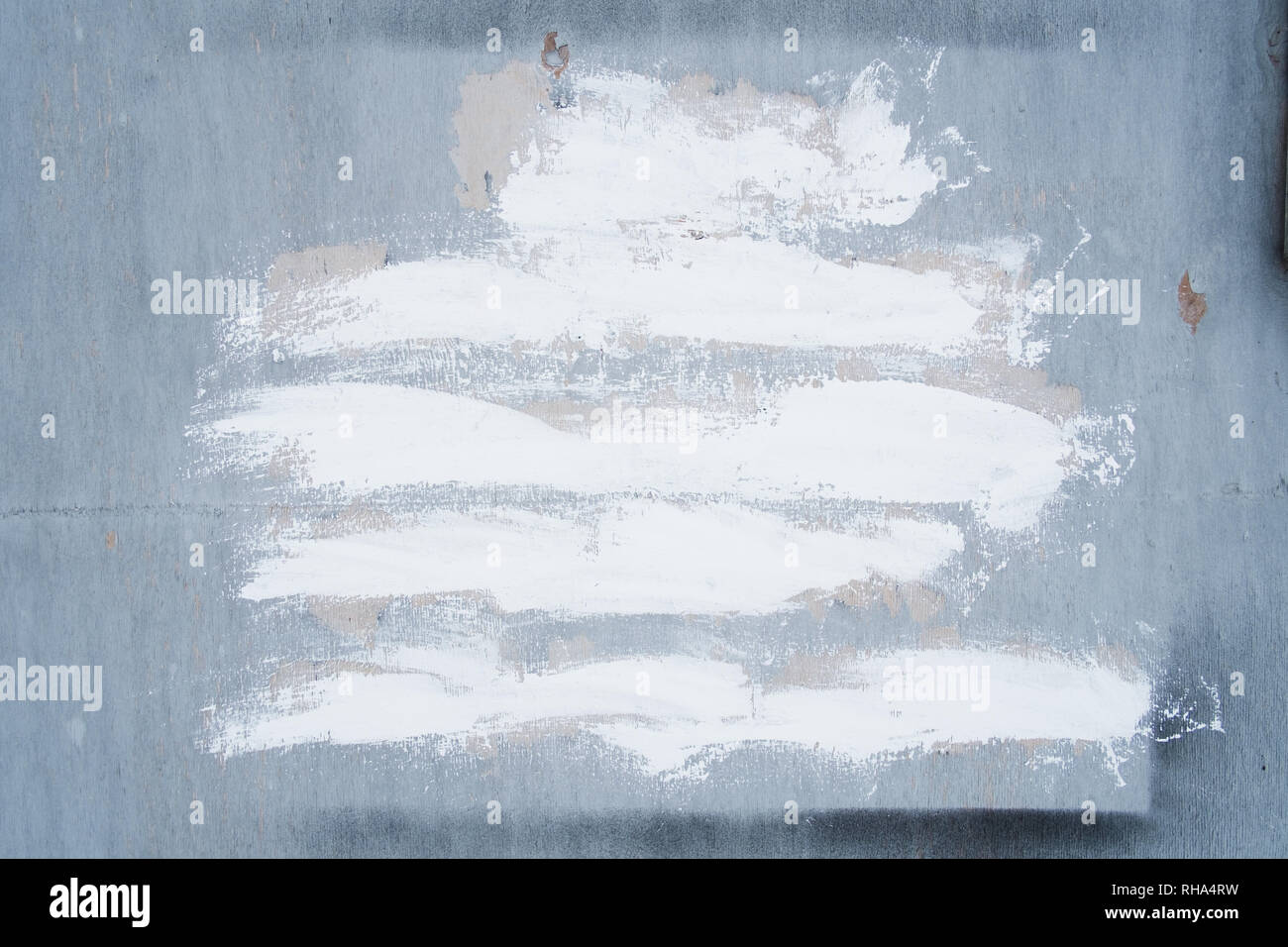 White paint stain on a gray wall. For inscription or sign Stock Photo ...