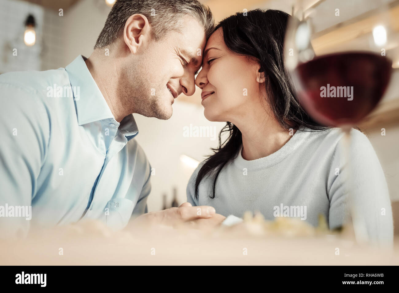 Affectionate woman and man spending time together Stock Photo - Alamy