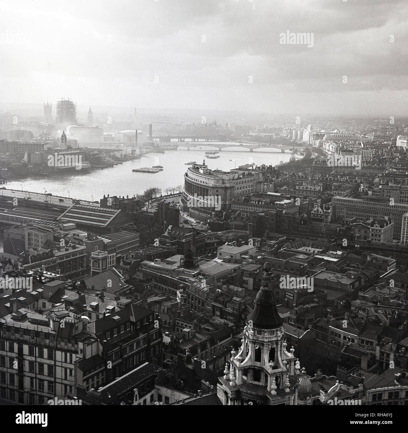 1950s, historical, aerial view over the River Thames and the city of ...