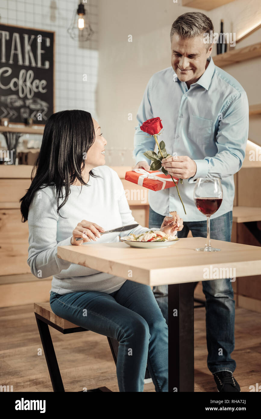 Pleasant man making a compliment Stock Photo - Alamy
