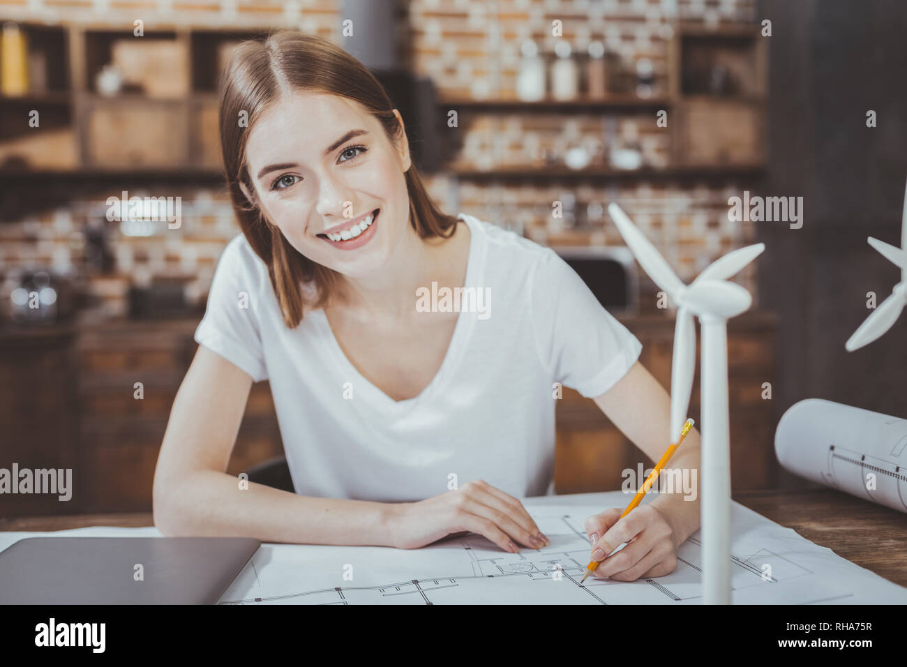 Amazing girl working at project with pleasure Stock Photo - Alamy