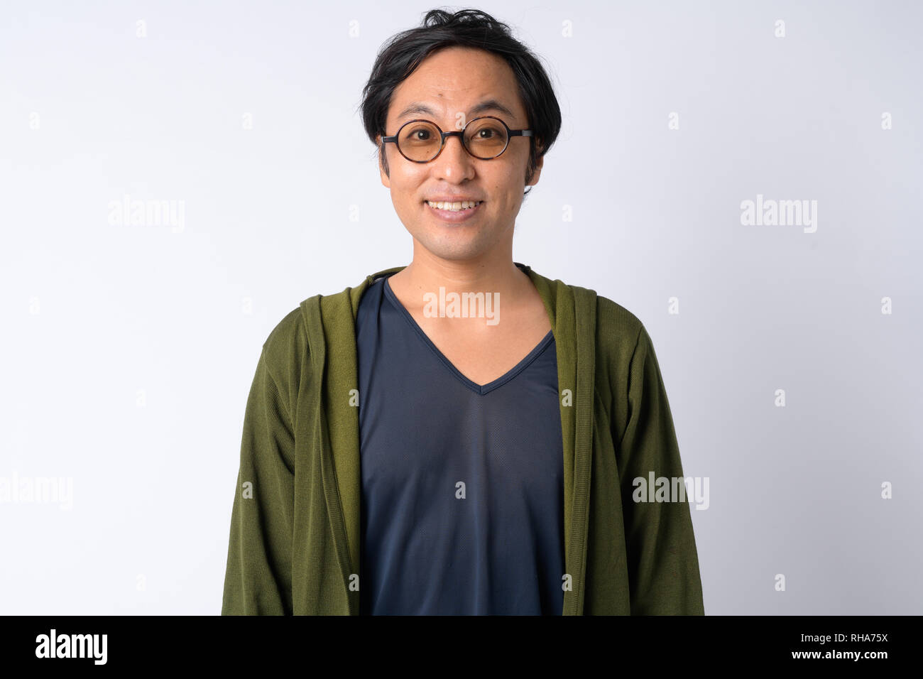 Portrait of happy Japanese man with eyeglasses smiling Stock Photo - Alamy