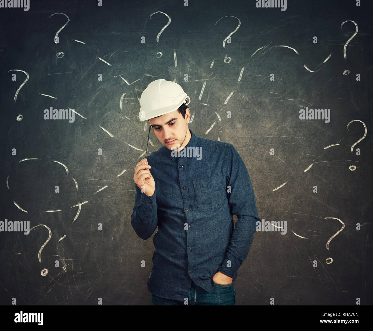 Young man thinking question marks hi-res stock photography and images ...