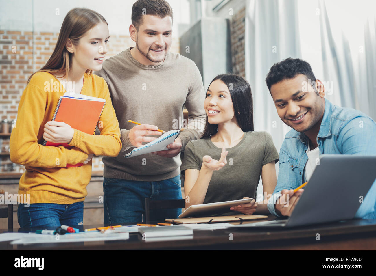 Four students studying hi-res stock photography and images - Alamy