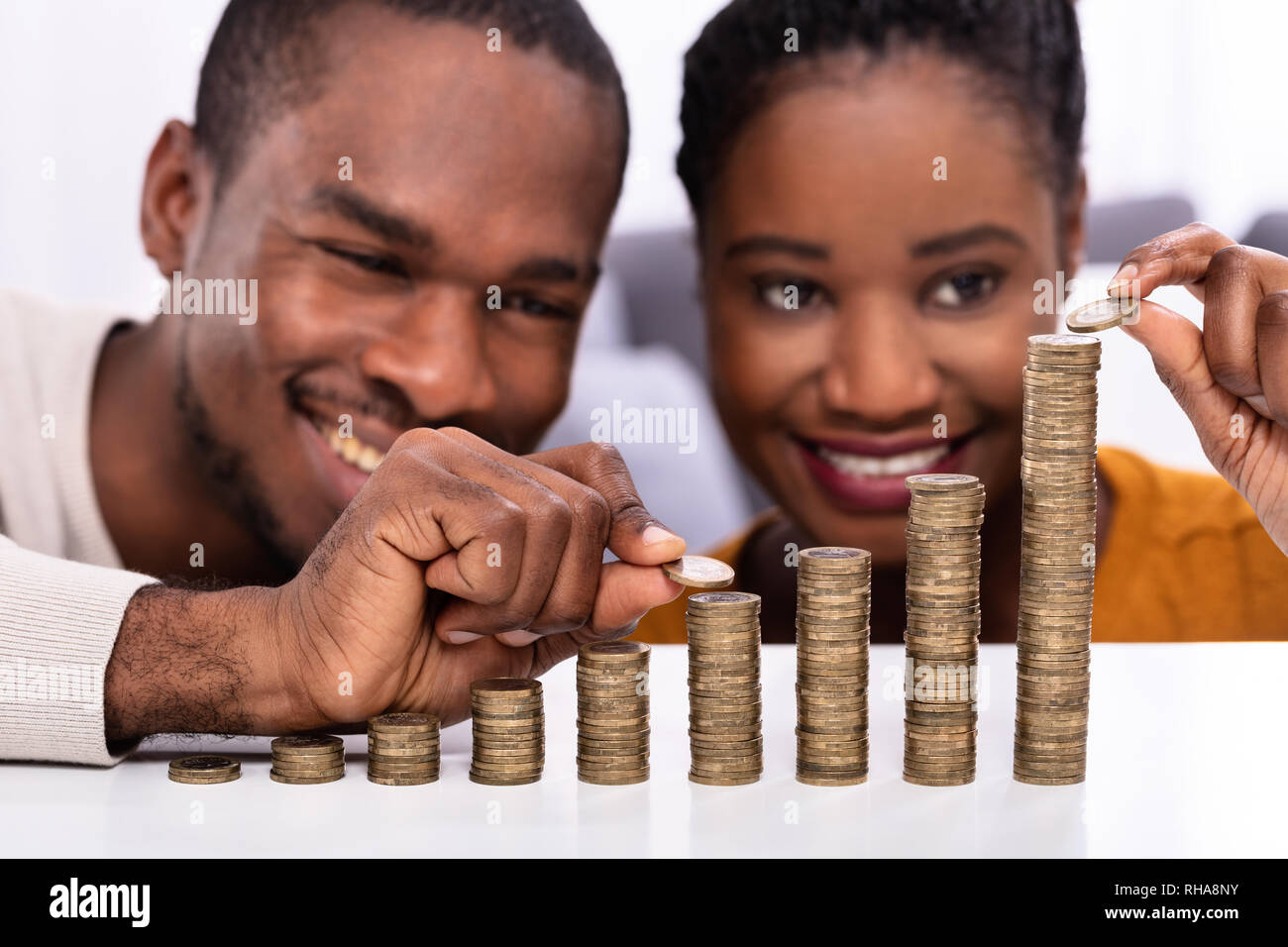 Stacking coins african hi-res stock photography and images - Alamy