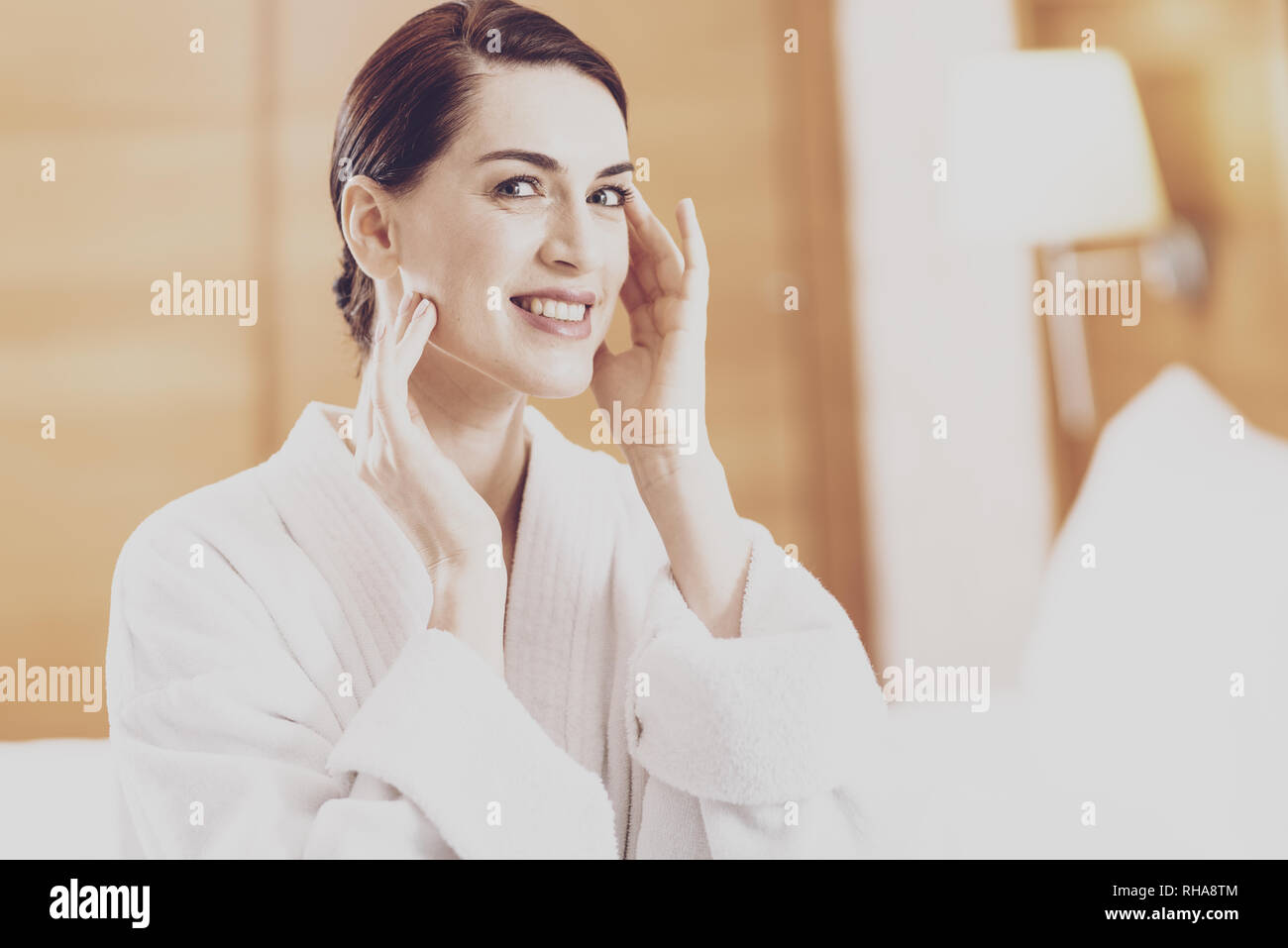 Optimistic housewife enjoying relaxation Stock Photo - Alamy