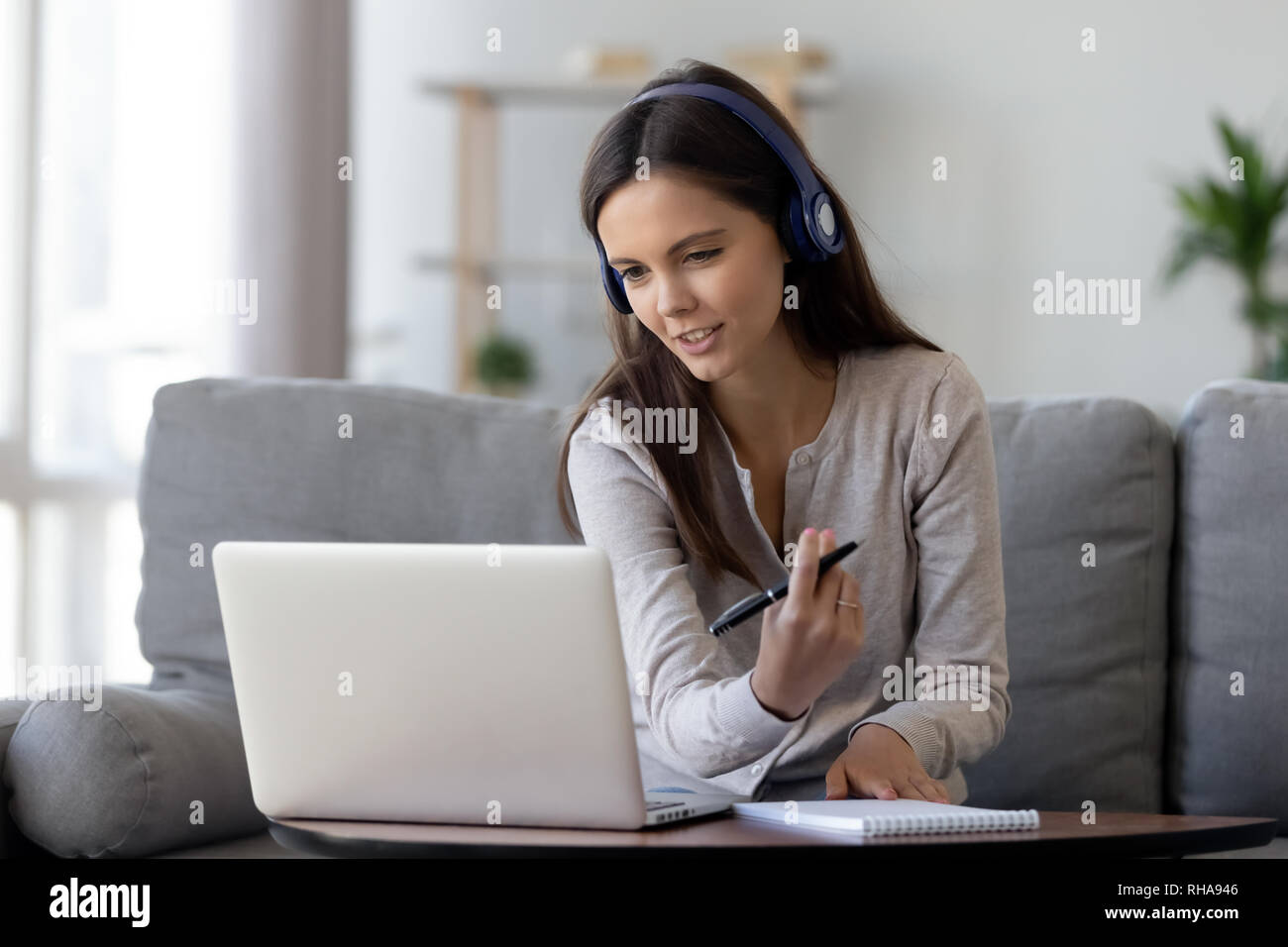 Speaking into computer hi-res stock photography and images - Alamy