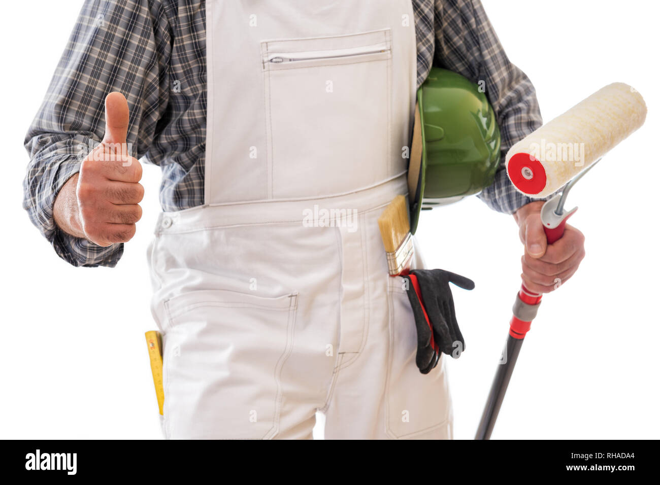 House painter worker in white work overalls with thumb up, holds in his ...