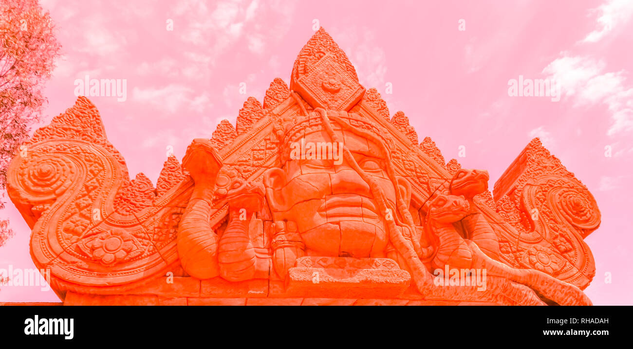 stone arch, sculptures at the entrance to the Park in coral color ...