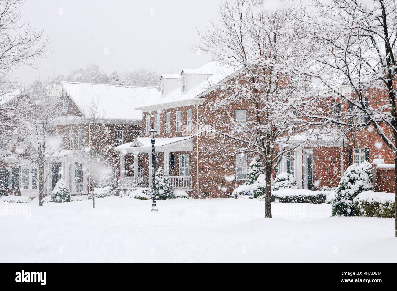 Traditional Brick Homes in a Neighborhood Covered in Snow After a Storm ...