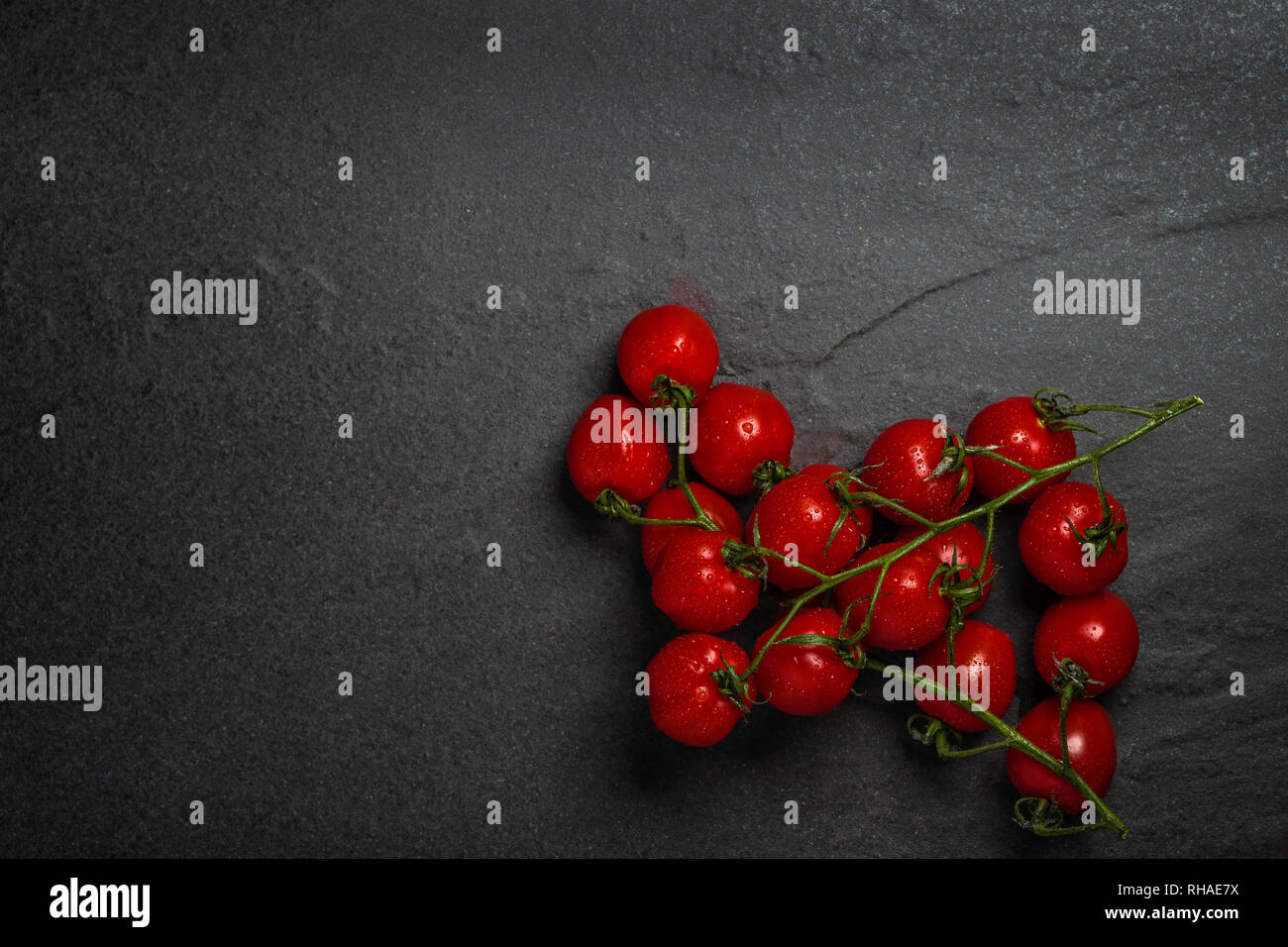Mini tomatoes vine hi-res stock photography and images - Alamy