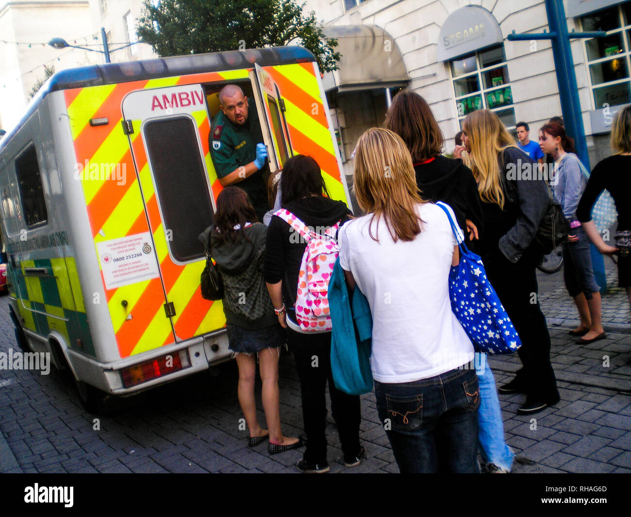 Emergency team takes care of Stone-drunk young girl, Cardiff, Wales ...