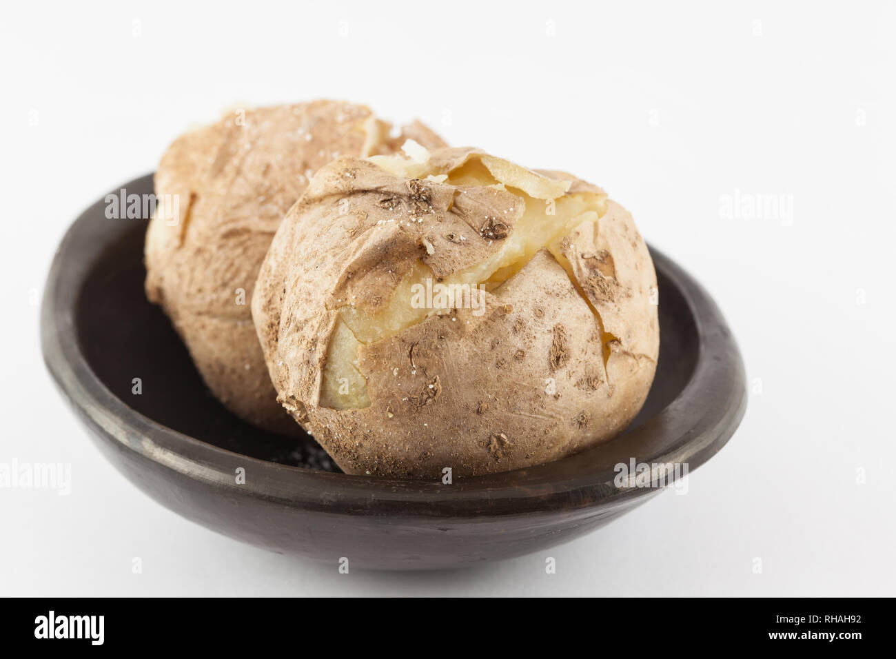 Traditional Colombian cooked potatoes called papas saladas isolated on ...