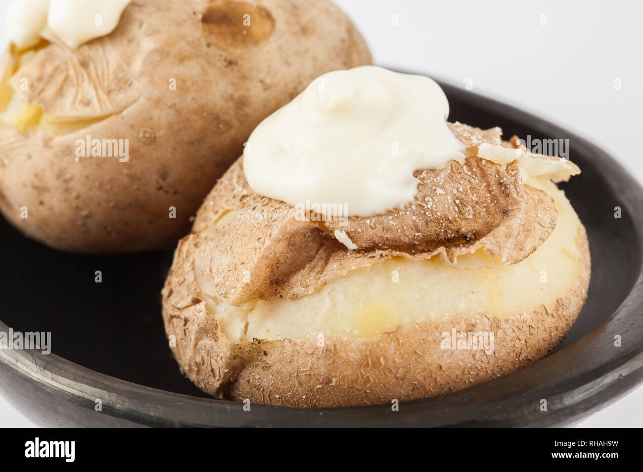 Traditional Colombian cooked potatoes called papas saladas topped with ...