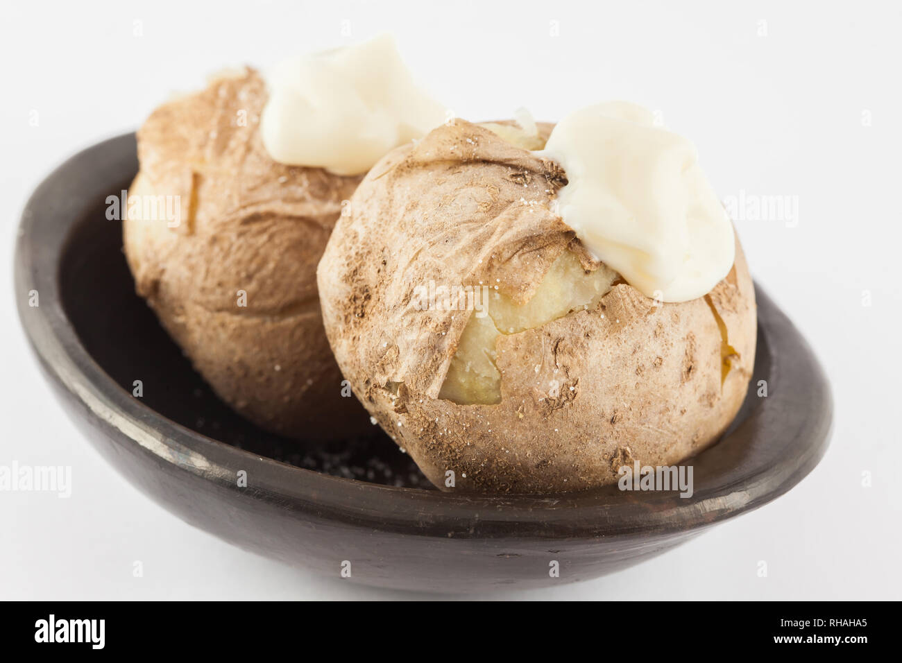 Traditional Colombian cooked potatoes called papas saladas topped with ...