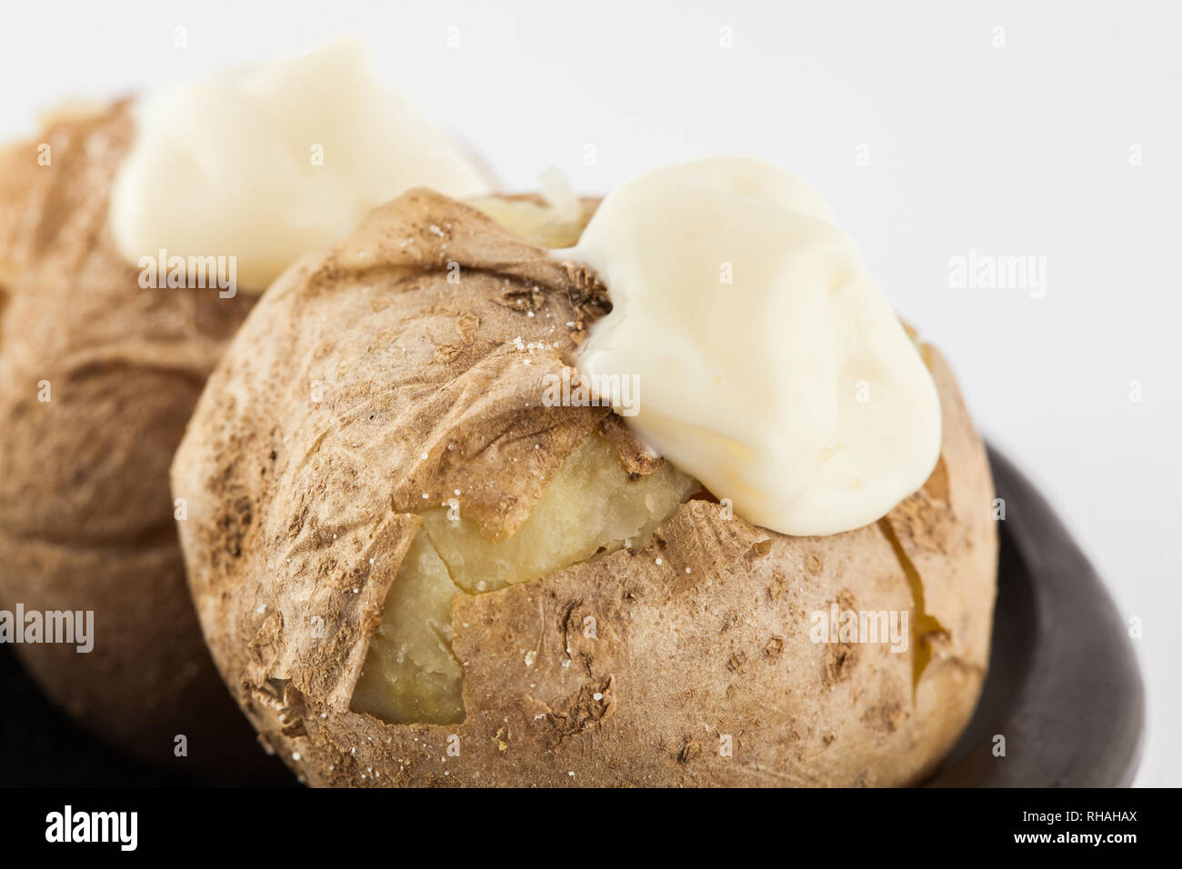 Traditional Colombian cooked potatoes called papas saladas topped with ...