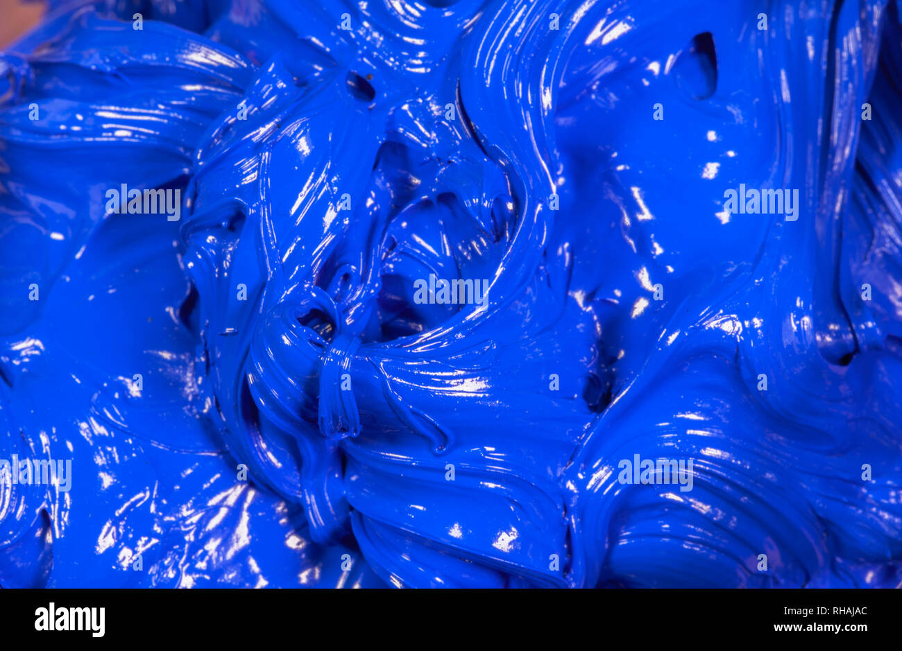 close up blue color of oil paint.ink of screen printing for print on ...