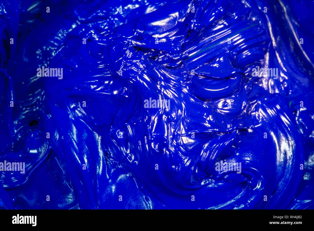 close up dark blue color of oil paint.ink of screen printing for print ...