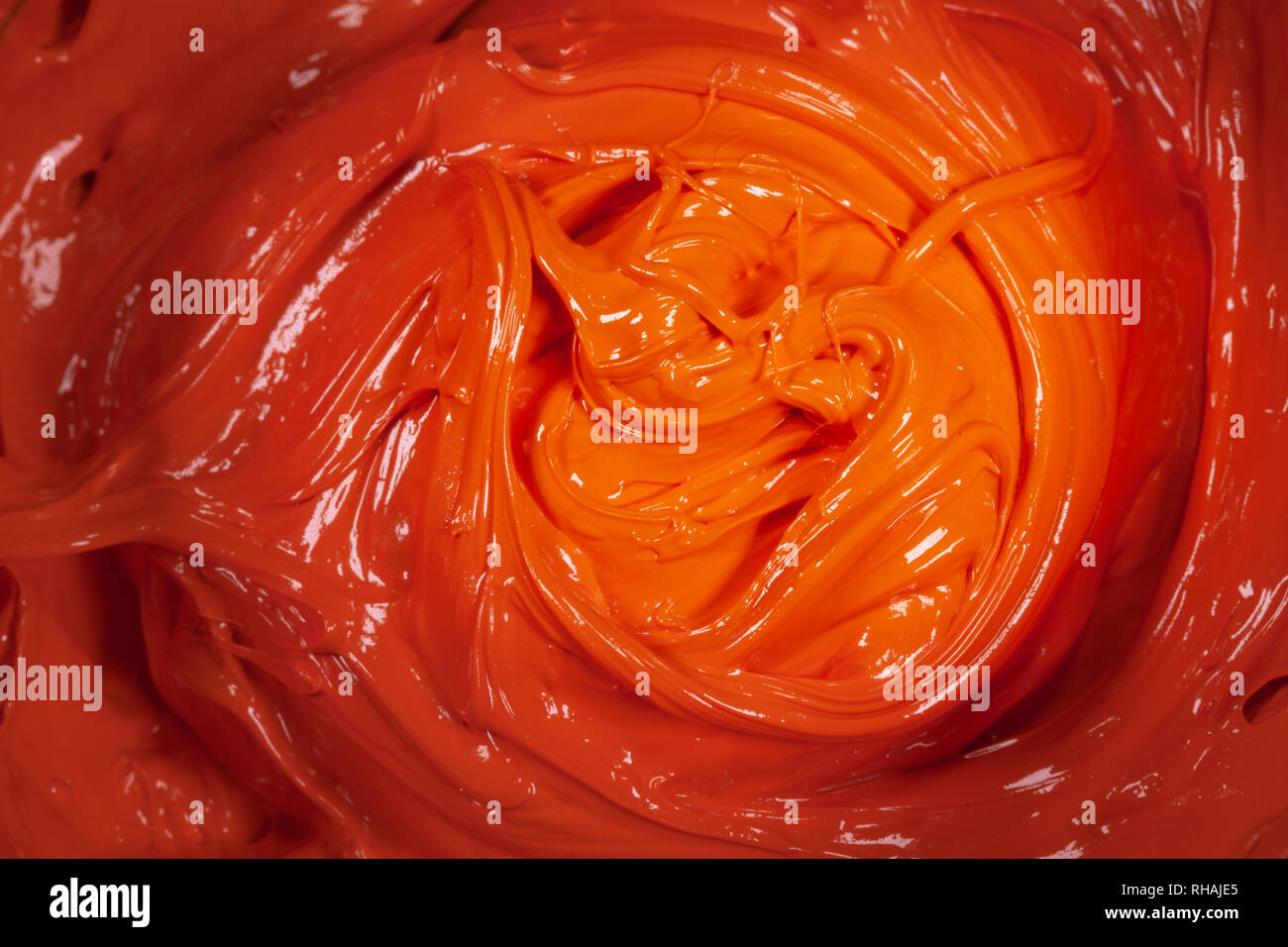 close up orange color of oil paint.ink of screen printing for print on ...