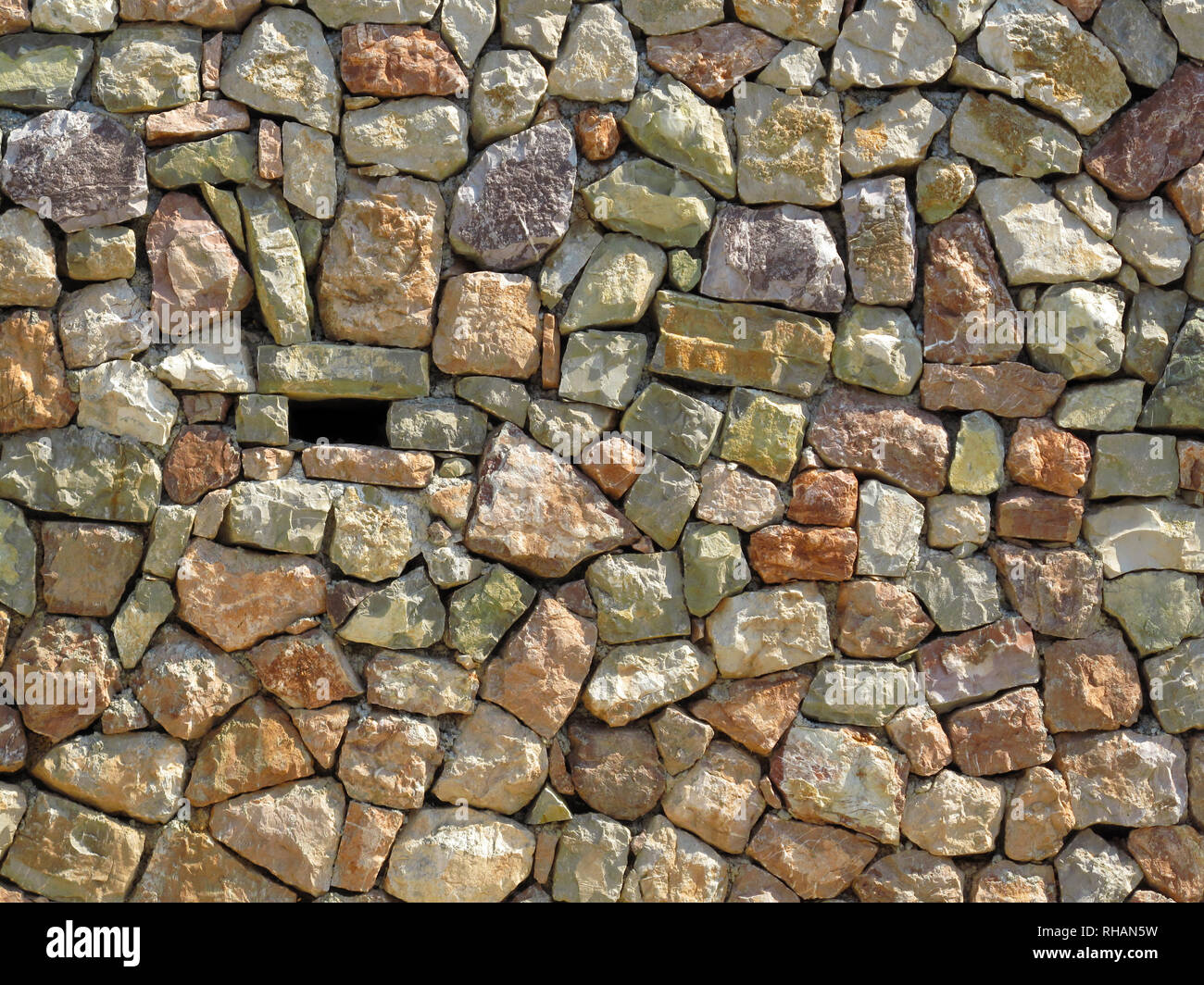 Stone wall background Stock Photo - Alamy