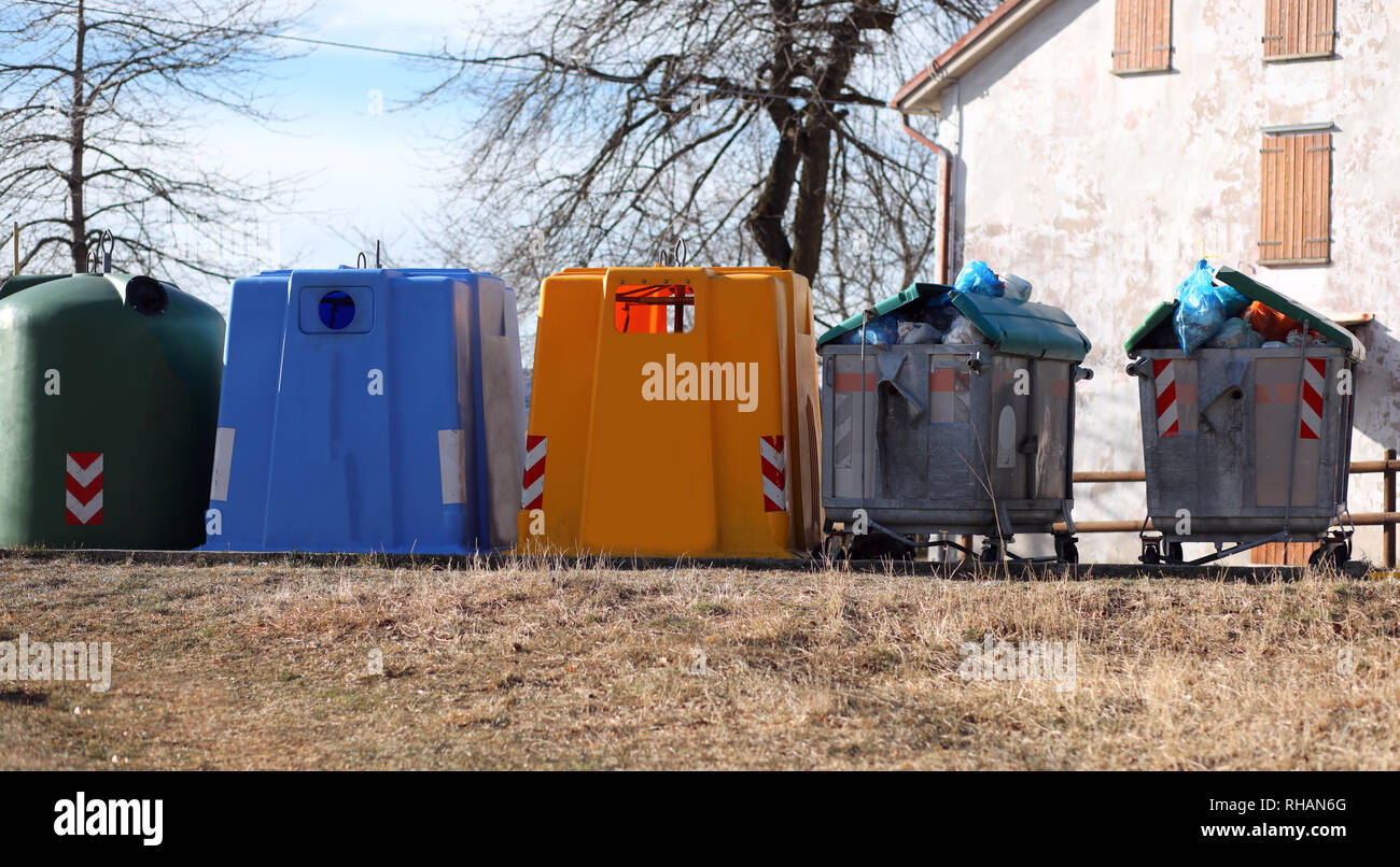 five large rubbish bins for municipal solid waste and for the separate ...
