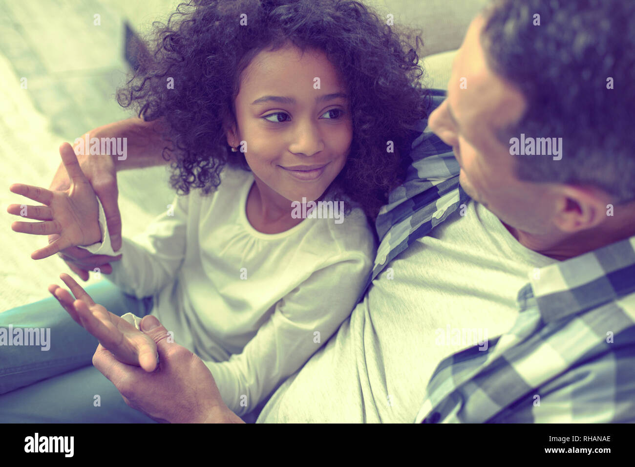 Intelligent child very happy to learn stuff with her beloved dad Stock ...