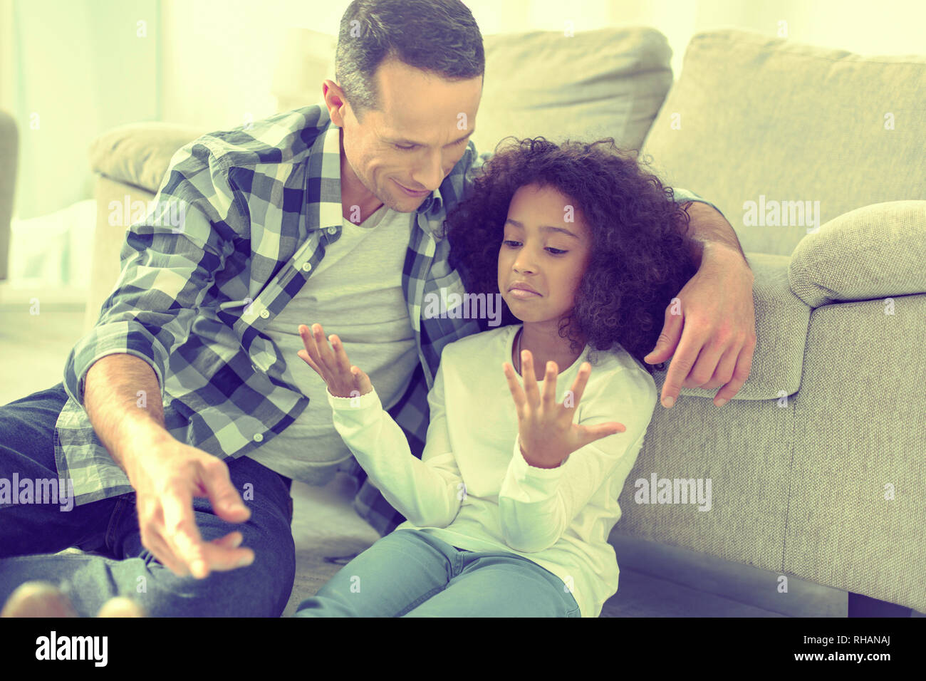 Supportive dad encouraging his little girl not to give up Stock Photo ...