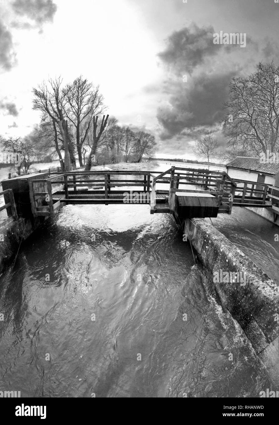 open sluice gate at ellingham on river waveney norfolk suffolk border ...
