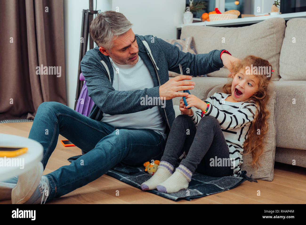 Scared child and angry father hi-res stock photography and images - Alamy