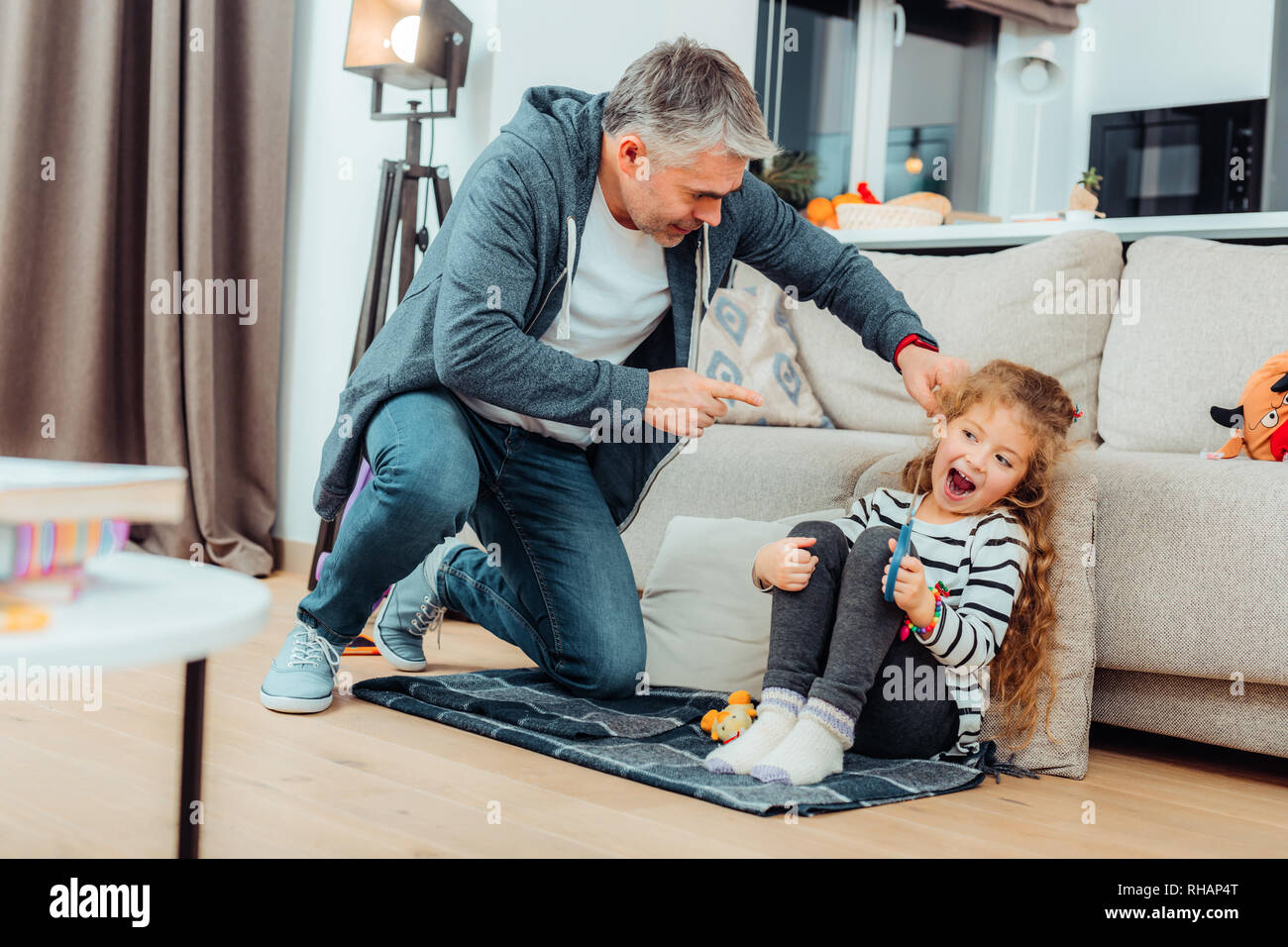 Being scared at home hi-res stock photography and images - Alamy