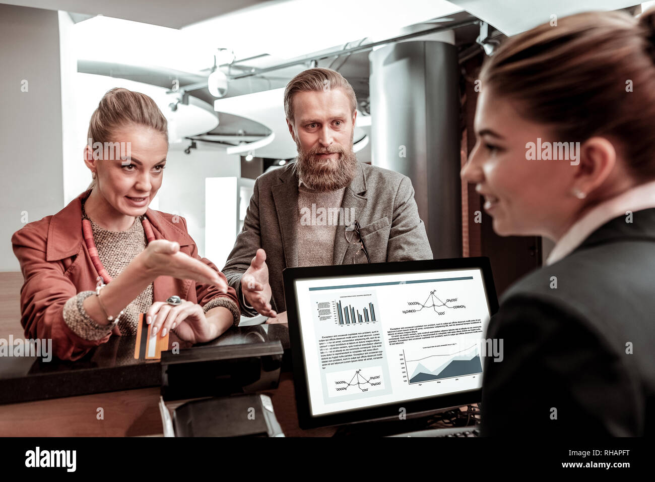 Hotel manager employee female talking hi-res stock photography and ...