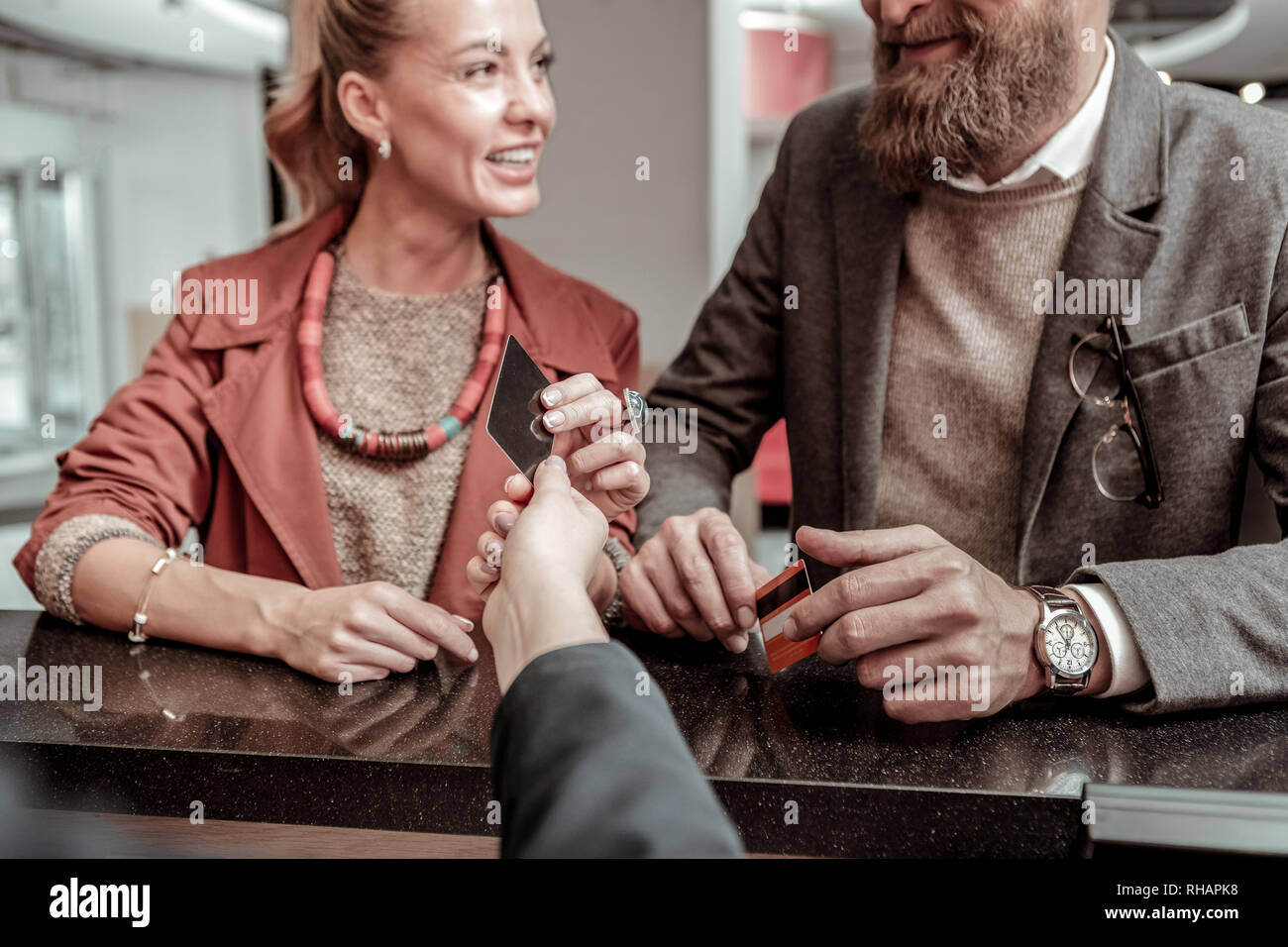 Pleasant talk. Kind girl expressing positivity while talking card Stock ...