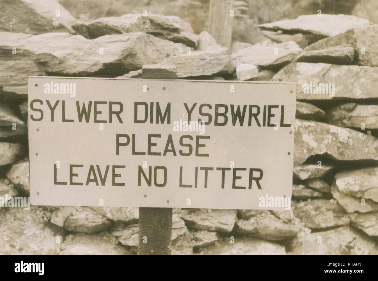Antique c1950 photograph, roadside sign in English and Welsh, “Please ...